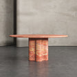 The Kachi Table with a unique wavy solid base