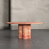 The Kachi Table with a unique wavy solid base