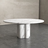 The Kachi Table with a unique wavy solid base