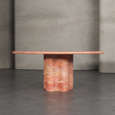 The Kachi Table with a unique wavy solid base