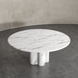 The Kachi Table with a unique wavy solid base