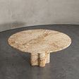 The Kachi Table with a unique wavy solid base
