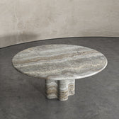 The Kachi Table with a unique wavy solid base