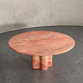 The Kachi Table with a unique wavy solid base
