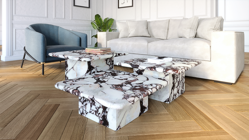 Reda Personalized Marble Table is a set of three staggered tables