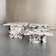 Reda Personalized Marble Table is a set of three staggered tables