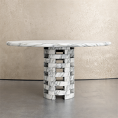 Round Brace Customizable Stone Dining Table features a unique design