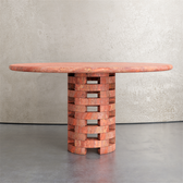 Round Brace Customizable Stone Dining Table features a unique design