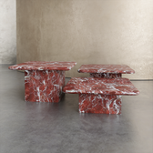 Reda Personalized Marble Table is a set of three staggered tables