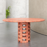 Round Brace Customizable Stone Dining Table features a unique design
