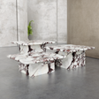 Reda Personalized Marble Table is a set of three staggered tables
