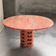 Round Brace Customizable Stone Dining Table features a unique design